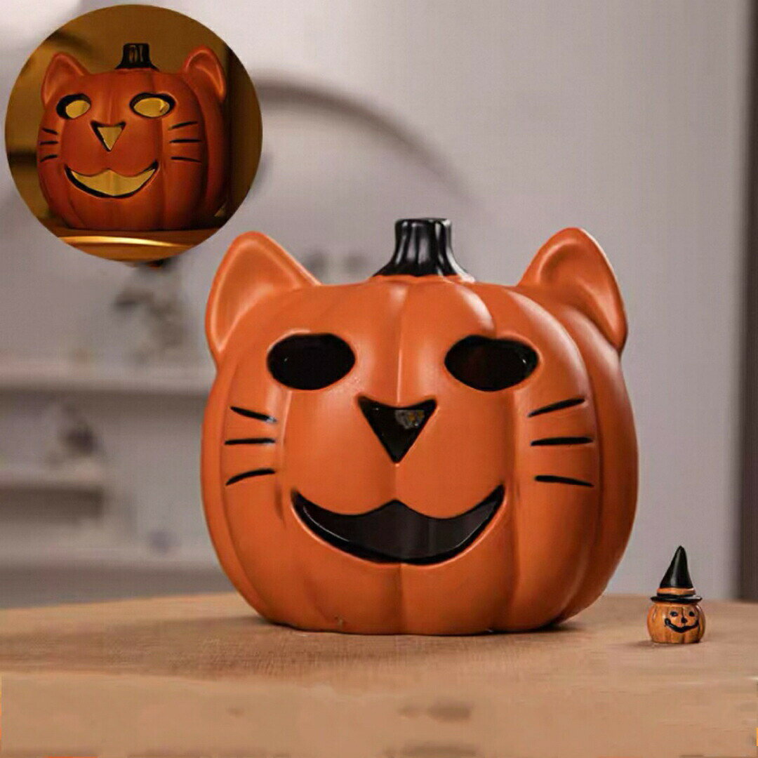 商品説明こちらは、猫をモチーフにした可愛らしいハロウィンパンプキンランタンです。ライトを入れると、猫の目や口から優しい光が漏れ、温かくユニークな雰囲気を演出します。?サイズ：高さ約21cm × 幅約21cm?重量：約220g?素材：樹脂製?...