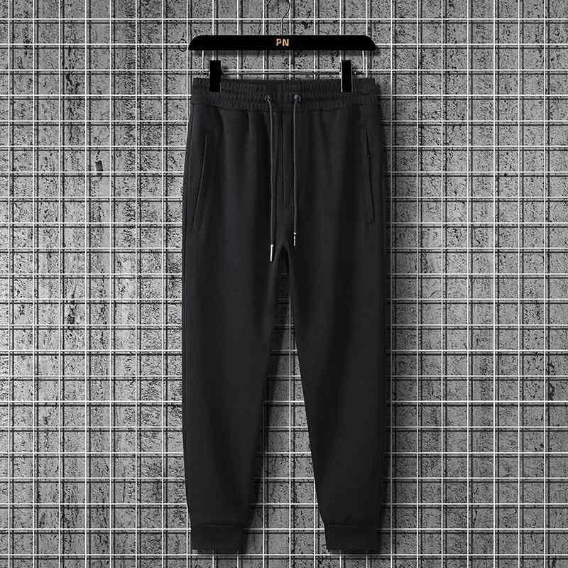 パンツ メンズ 男性用 スウェットパンツ スポーツ 9分丈 大きいサイズ ゆったり 部屋着 春秋 グレー 黒・スタイル: 韓国版・対象: 24-35歳・パンツのタイプ: 鉛筆パンツ.スキニーパンツ・フィット: ルーズ・パンツ丈: 9分丈・ウ...