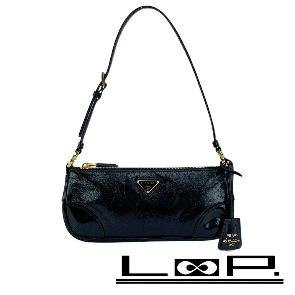 ■商品紹介■ 【型番】1B201 【素材】パテント 【カラー】NERO 【サイズ】約横23×縦10×幅5.5cm/ショルダーストラップ約49～54cm 【付属品】キーリング 【ランク】S 【コメント】ほぼ使用せず保管していただけなのか非常に...