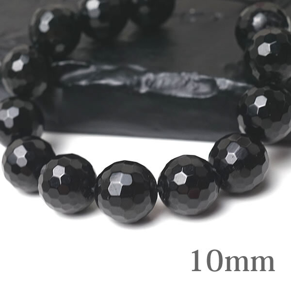 商品情報天然石ブラックトルマリン　128面カット形状ラウンドビーズ(穴あき)粒サイズ約10mm（±0.5mm）通し穴サイズ約1mm前後注意事項※紐で通した連の状態からランダムに選んだ物をお届けさせて頂きます。※天然石の為、一粒ごとに色合いや...