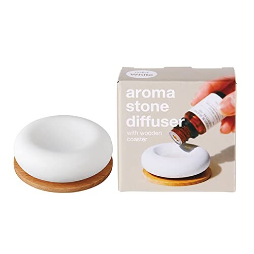 アロマストーンディフューザー(ホワイト)1個 芳香器 木のコースター付 お好きなオイルが楽しめます 【 簡単にアロマが楽しめる 】 好きなアロマオイルをたらすだけ! いつでも楽しめる簡単アロマ! 【 使い方はあなた次第 】 無限大の使い方!...