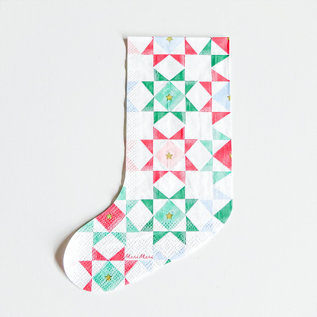 Patchwork Stocking Napkins 279915 パッチワーク風デザインが可愛い、クリスマスソックス型のペーパーナプキンです。 テーブルに置くだけで、クリスマスパーティーがぱっと華やかな雰囲気に。カラフルで遊び心のあるデザ...