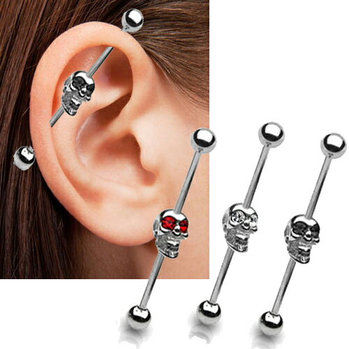 立体感のあるスカル（ドクロ）の大きな目にキュービックジルコニアをはめ込んだ宝石のようなインダストリアルバーベル。スカルの持つ不気味さとジュエルの持つ高級感が存在感を発揮してくれるメガバーベルです。ピアスホールとピアスホールをつなげるインダス...