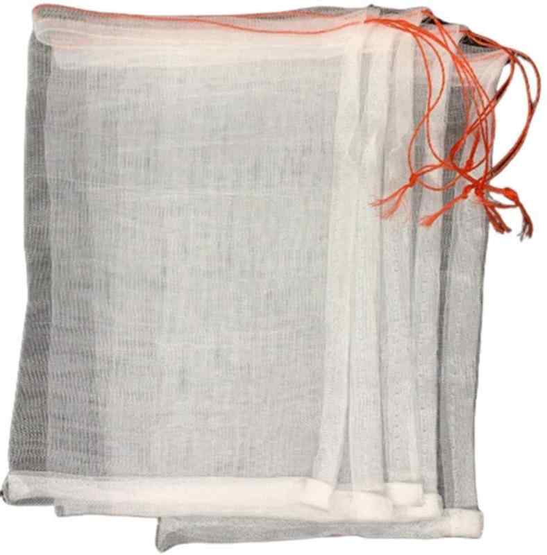 KINOKINO 果物 保護 袋 果実 防虫 ネット 種入れ 鳥よけ網 防鳥虫や鳥から大切に育てた果物を守る防虫、防鳥ネットの便利なセット商品になります。巾着袋になっていますので、取り付けが簡単です。トマト、ナス、ブドウ、リンゴなどにお使い...