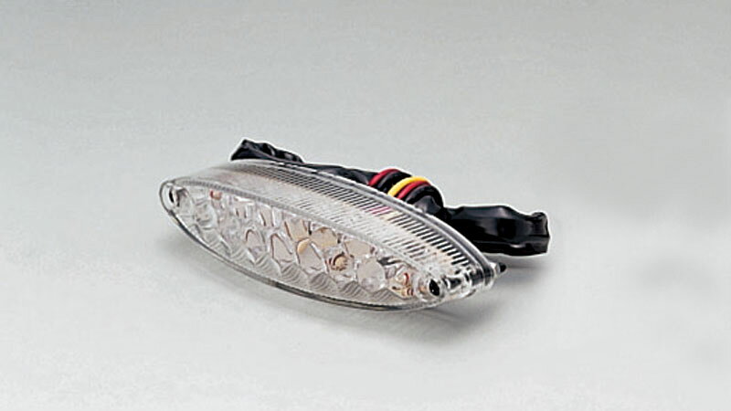 LEDスリムキャッツアイテ-ルランプ。テ-ルランプ用に20個とナンバ-照明用に5個のLEDを使用。装着はM3ボルトによる固定【色】クリア【取付けネジ間ピッチ】95mm【本体サイズ 】108(幅）x29(縦)mm商品によっては [PDF] 図...
