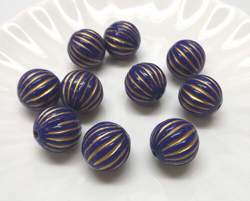 【サイズ】直径 約1.3cm 【色】ネイビーx柄ゴールド 【素材】アクリル 【入数】10個 ＊欠けなど、大幅な欠損については検品で取り除いておりますが、多少の柄のカスレ、 　 バリ、微細な傷等につきましては検品を通しておりますことをご了承く...