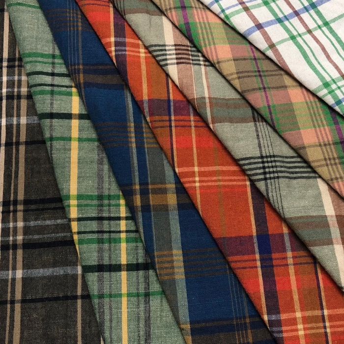 ※「モニターの発色により実際と異なる場合があります。ご了承ください。」 国産のコットンマドラスチェックです。 ワッシャー加工によって洗い晒したような表情に仕上げています。 絶妙なカラーリングによる7色展開となっています。 やや細手の綿糸をタ...