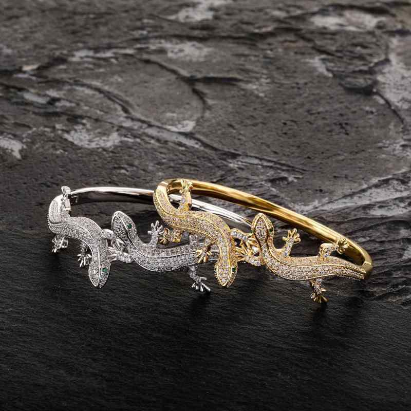 ・カテゴリ: 手元アクセサリー・スタイル: ヒップホップ・素材: 銅・加工技術: マイクロパヴェ・モチーフ: 蜥蜴・特徴: 個性派・カラー展開: ゴールド、シルバー・重さ: 約21.04g