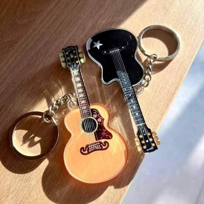 ・加工方法: 手作業・素材: 混合・カラー展開: 原木色、ブラック・スタイル: 個性的トレンド・タイプ: バッグチャーム・柄: ギター