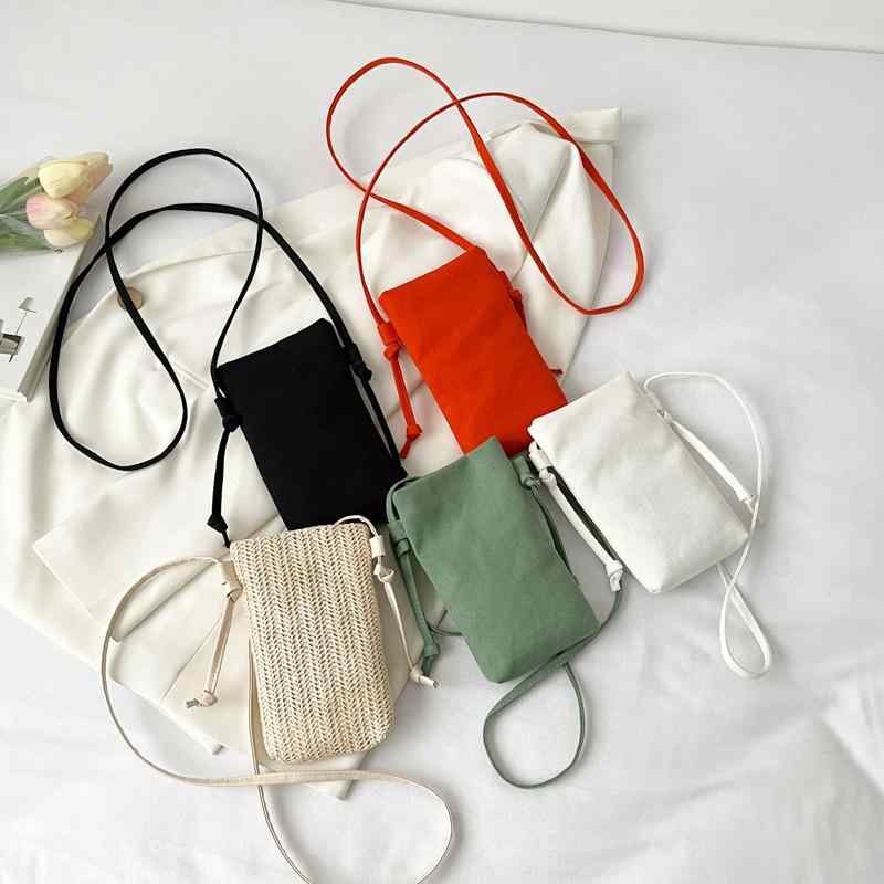 ・カラー展開: ホワイト、ブラック、オレンジ、グリーン・スタイル: ストリートカジュアル・素材: 帆布・バッグのスタイル: ミニスクエア・デザイン要素: ステッチ・裏地素材: ポリエステル・バッグの形状: 縦型スクエア・開閉方法: マグネッ...