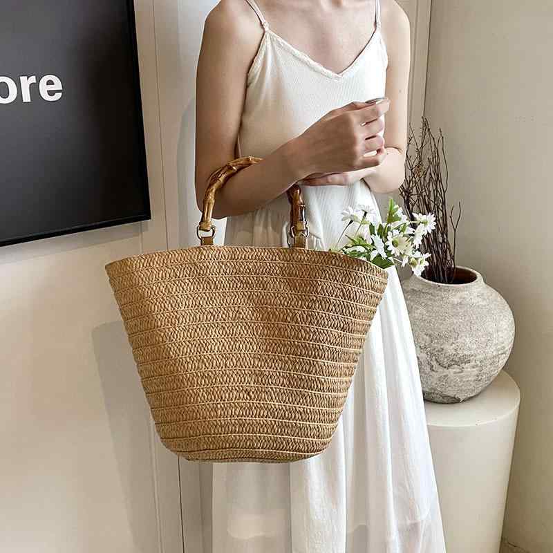 ・カテゴリ: 草編みバッグ・カラー展開: カーキ、ベージュ・スタイル: トレンド・主な素材: PU・バッグサイズ: 大・流行要素: ストロー・裏地素材: ポリエステル・バッグ形状: 楕円形・開閉方式: ファスナー・バッグ内部構造: ファスナ...