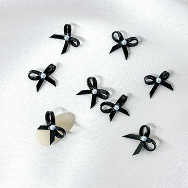 商品到着後レビューを書いて次回使える200円OFFクーポンGETブラック 立体感のあるリボンパーツです。色味によってさまざまな系統でお使いいただけます。8P縦約10mm×横12mm×厚み4mm