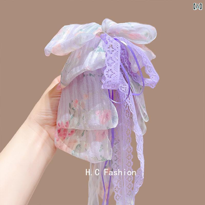 ・カテゴリ: ヘアアクセサリー・スタイル: 清新スウィート・主な素材: 布・ヘアアクセサリーの種類: ポニーテールクリップ・柄: 紫色小花柄、リボン・カラー展開: パープル・加工方法: 手作り・対象: 女性