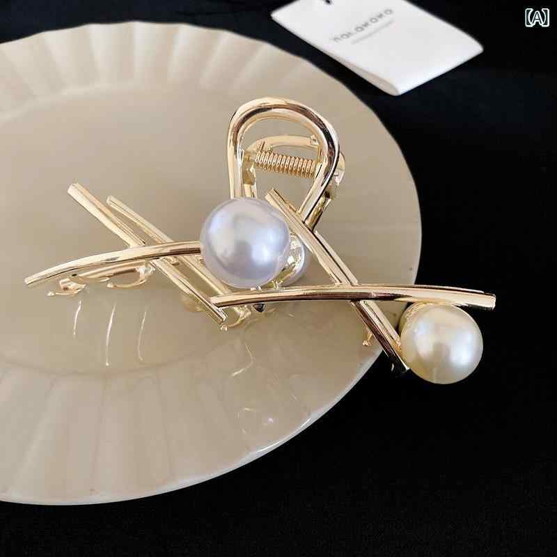 ・カテゴリ: ヘアアクセサリー・種類: シャーククリップ・主な素材: 合金・カラー: パールクロス・要素: クロス・加工方法: メッキ・テイスト: インスタ風・スタイル分類: 個性的なトレンド・対象: 女性