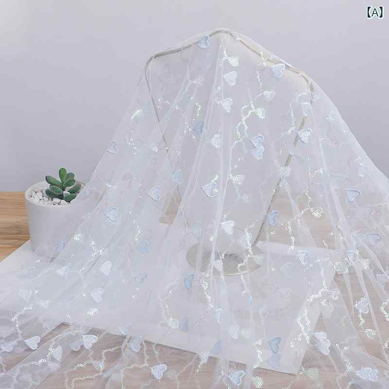 ・素材: ポリエステル・重量: 約45g/平方メートル・生地幅: 130cm・刺繍工芸: コンピュータ刺繍・主な用途: ウェディングドレス、ルームウェア、キャミソール、ステージ衣装・柄: 幾何学模様・トレンド要素: 欧米風・カラー展開: ブ...
