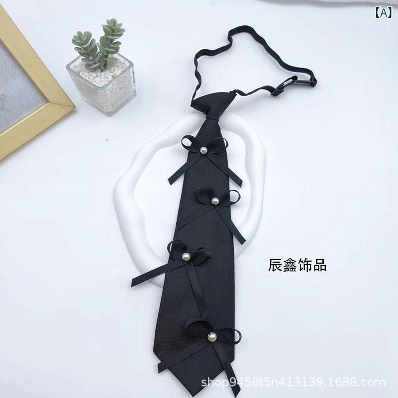 ・カテゴリ: ネクタイ・種類: ボウタイ・対象: レディース・対象年齢: 大人・スタイル: トレンディ・: 矢印型・結び方: 免結び・幅: 標準・長さ: ミドルショート・装飾: パール、ラインストーン