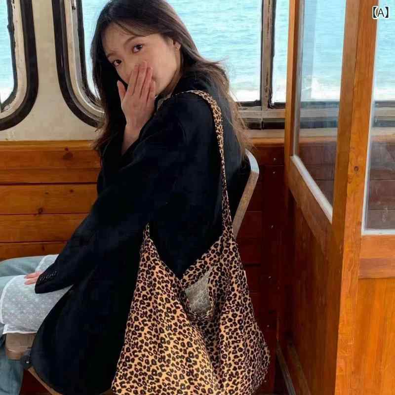 ・カテゴリ: トートバッグ・スタイル: アーバンシンプル・主な素材: キャンバス・裏地素材: ナイロン・柄: レオパード・カラー: ブラウンレオパード・サイズ: 大・形状: 横長方形・開閉方式: オープン・硬さ: ソフト・外ポケット: 立体...