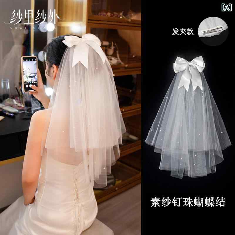 ・カテゴリ: ウェディングベール・スタイル: スウィート・対象: レディース・素材: チュール・形状: リボン・種類: 二重構造・装飾: パール・長さ: 約50cm・カラー: ホワイト・留め具: ヘアクリップ・適用場面: 結婚式、誕生日
