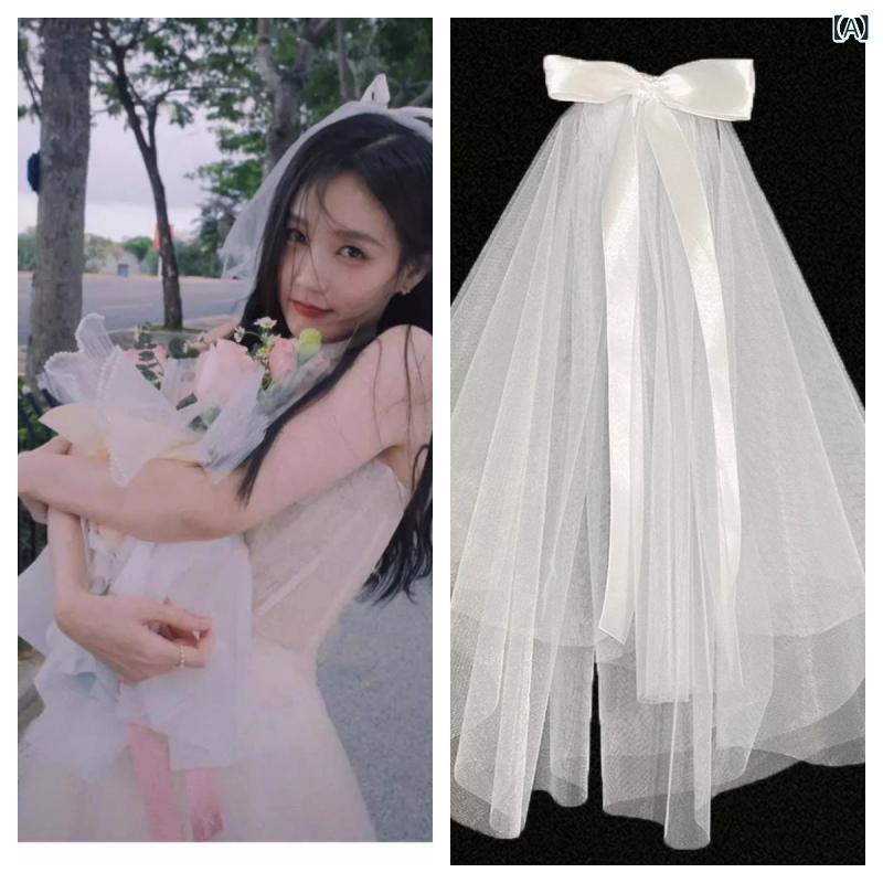 ・素材: チュール・スタイル: 有名人同モデル・対象: 女性用・デザイン: リボン・種類: 二重・クリスタル種類: ホワイトクリスタル・おすすめ用途: 結婚式、誕生日、旅行記念、祝日・カラー: オフホワイト・長さ: 60cm以下・カテゴリ:...