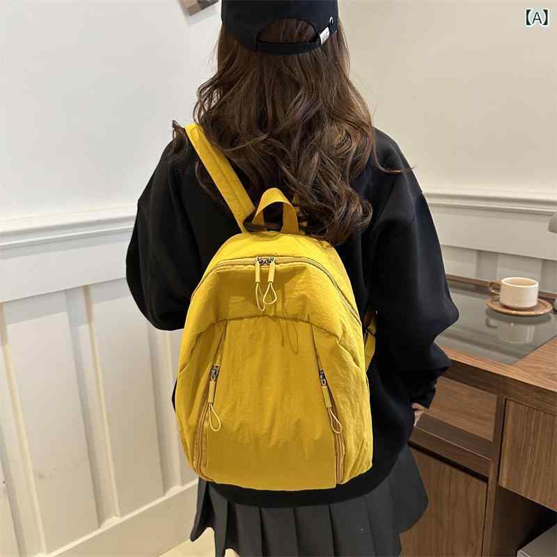 ・カラー展開: イエロー、ブラック、カーキ、グリーン・性別: 女性・シーン: 日常使い・スタイル: アーバンシンプル・容量: 20L以下・機能: 軽量化・柄: 無地・裏地素材: ポリエステル・デザイン要素: ステッチ