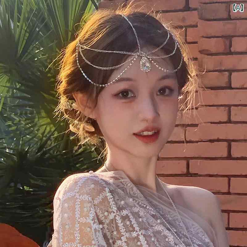 ・カテゴリ: ヘアチェーン・スタイル: 異国情調・主な素材: ラインストーン・装飾: フリンジ、水滴・加工: メッキ・カラー展開: 銀色、金色