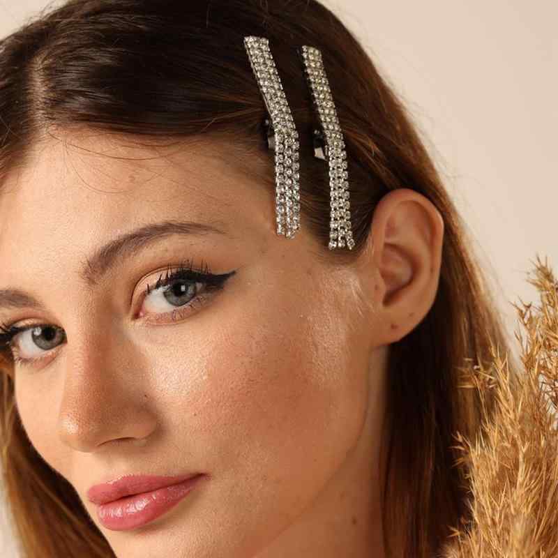 ・カテゴリ: ヘアアクセサリー・スタイル: OL・主な素材: ラインストーン・加工: メッキ・種類: バナナクリップ・カラー展開: ゴールド、シルバー・装飾: フリンジ・対象: 女性