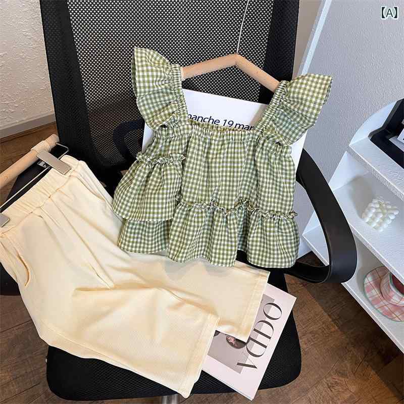 ・カテゴリ: 子供服セット・性別: 女の子・対象年齢層: 中小児 (3〜8歳)・スタイル: 韓国・セットアップ種類: パンツセット・セット内容: 2点セット・袖丈: 半袖・パンツ丈: ロング・柄: チェック・主な素材: ポリエステル50%混...