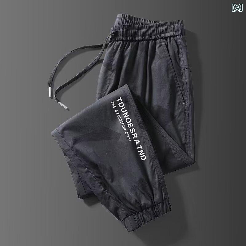 ・スタイル: 通勤・タイプ: ジョガーパンツ・パンツシルエット: テーパード・丈: ロング・ウエスト: ミドルウエスト・フロント: ドローストリング・厚さ: 薄手・柄: 迷彩・対象: 青少年・生地名称: 化学繊維混紡・主な素材: ポリエステ...