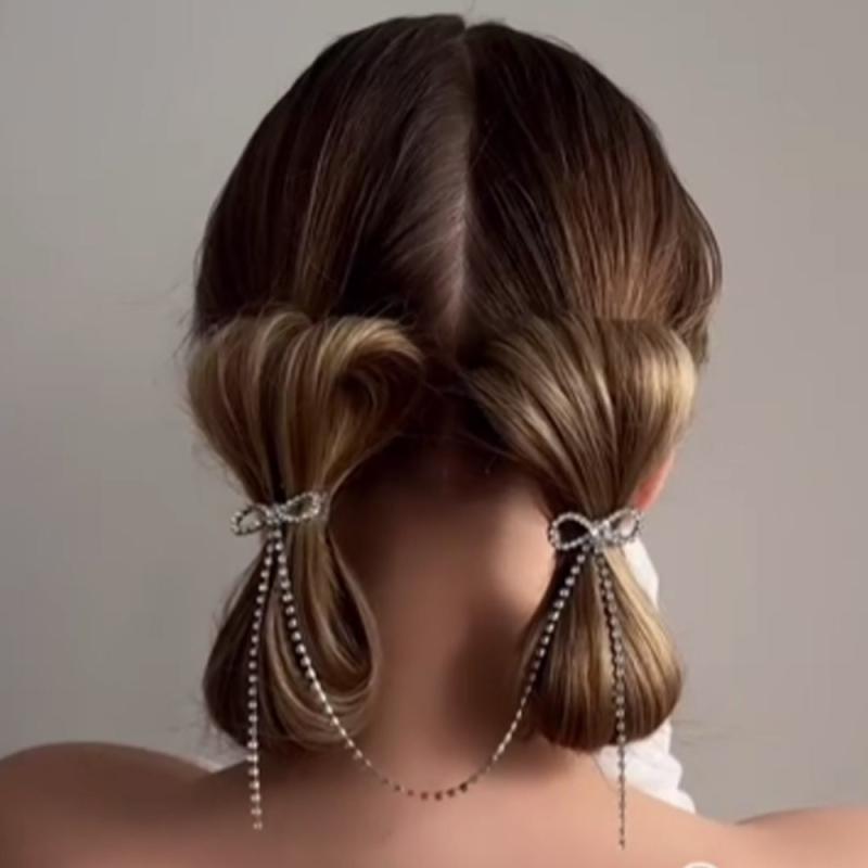 ・カテゴリ: ヘアアクセサリー・種類: ポニーテールクリップ・スタイル: シンプル・主な素材: ラインストーン・加工: メッキ・流行要素: 蝶結び・カラー展開: ゴールド、シルバー・対象: 女性