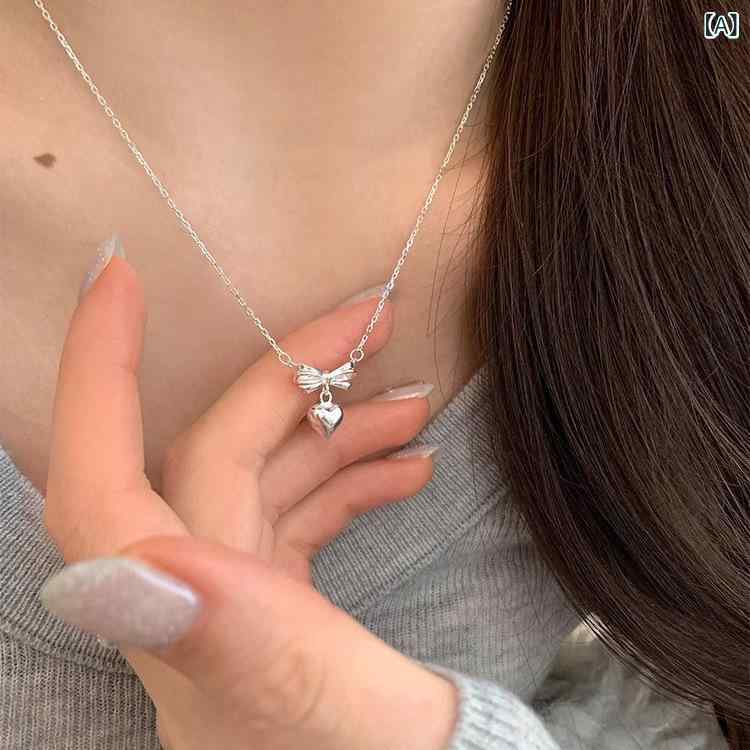 ・カテゴリ: 項飾・主な素材: 925銀・加工技術: 研磨・デザイン: ハート、リボン・チェーンの種類: O字チェーン・チェーンの長さ: 41cm〜50cm・カラー展開: シルバー・モチーフ: リボン・スタイル: コンテンポラリー、通勤ファ...