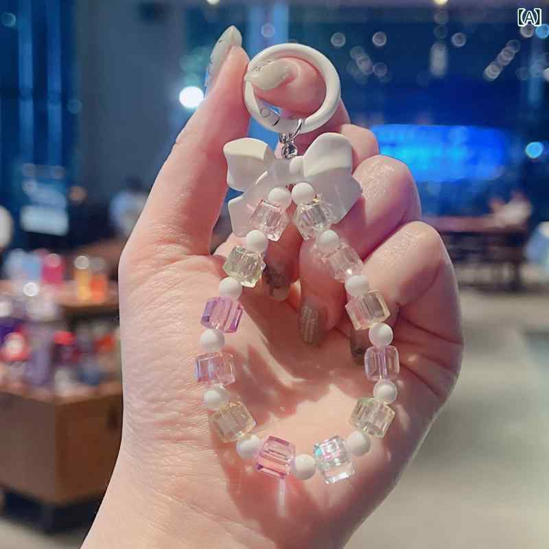 ・加工方法: メッキ加工・素材: プラスチック/樹脂・カラー展開: ホワイト、ブラック、イエロー・スタイル: 韓国風・アイテム: キーホルダー・柄: リボン・スタイル分類: フレッシュ＆スイート・デザイン要素分類: 形状、柄
