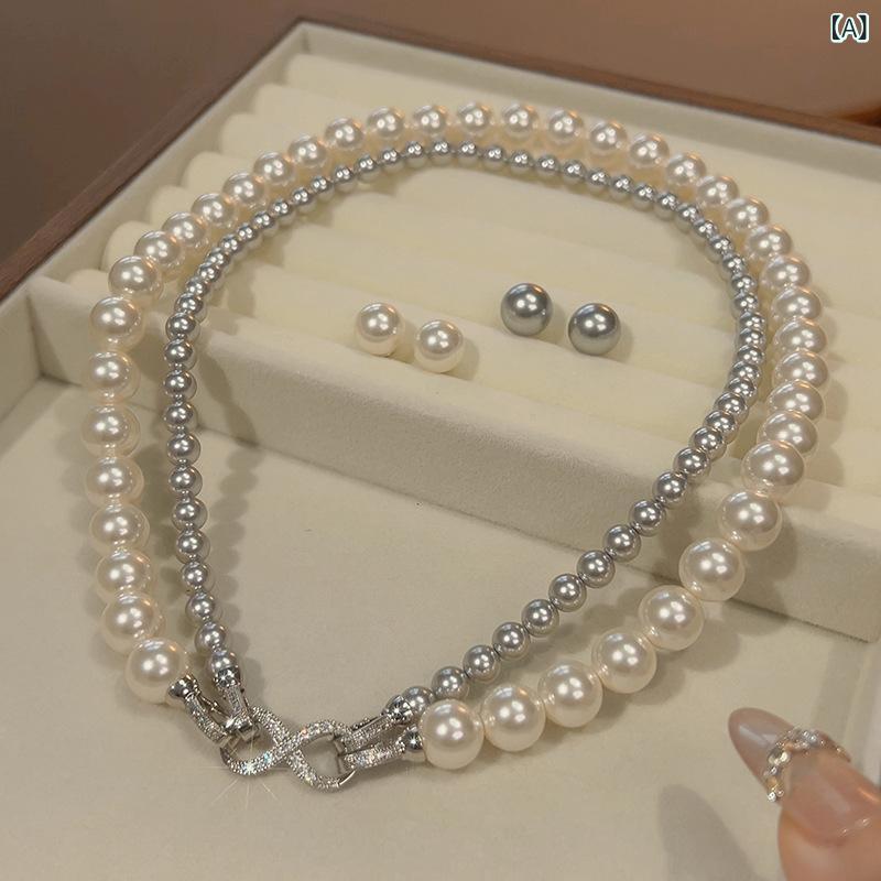 ・主な素材: フェイクパール・加工技術: パール装飾・セット内容: ピアス、ネックレス・チェーンスタイル: レギュラーチェーン・カラー展開: ホワイト、グレー・デザイン要素: パール・スタイル: フレッシュ、フェミニン・カテゴリ: セットア...