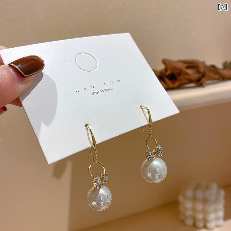 ・カテゴリ: 耳飾り・スタイル: 清新フェミニン・主な素材: 合金・加工技術: 電気メッキ・デザイン: リボン・トレンド要素: リボン・対象: レディース