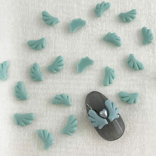 ブルー 20P小さいサイズの羽パーツです。置くだけで流行のアートが完成します。右×10P 左×10P の合計20Pです。右×10P 左×10P縦約7mm×横約4mm×厚み約2mm【メール便OK】※この商品はメーカー取り寄せ商品になります。メ...