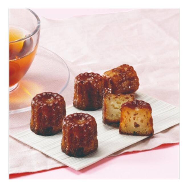 16世紀のフランス、ボルドー地方の伝統的な焼き菓子です。 小さな王冠のような形をしており、外側はこげ茶色のしっかりした焼き色がついていますが、 中はモッチリ、しっとりとした食感です。 ラム酒を使用しているので一口食べるとふわっとラム酒が香り...