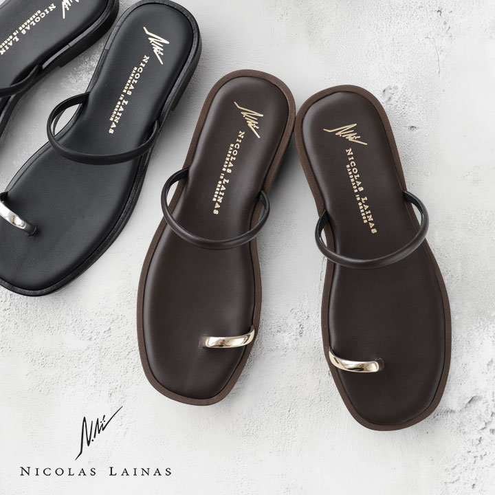 メーカー希望小売価格はメーカー商品タグに基づいて掲載していますNICOLAS LAINAS リングベルト フラットサンダル 華奢ストラップで足元を軽やかに夏コーデに映えるメタリックサンダル 華奢なリングストラップとメタリックカラーが目を惹く...