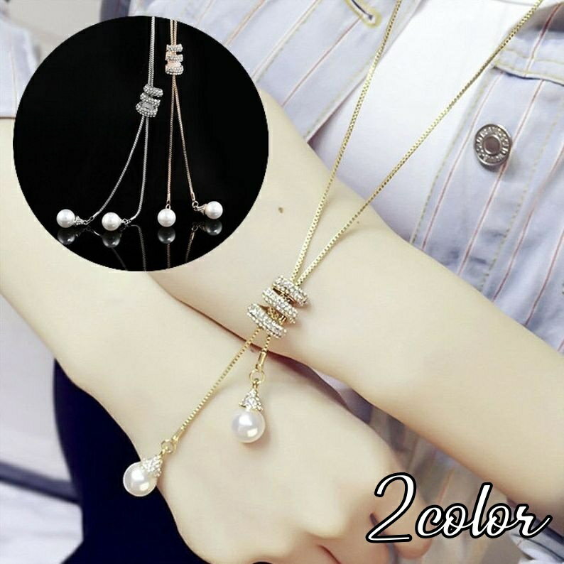 ダブルの大粒フェイクパール＆3連リングのラインストーンがキラリ☆ ラリエットタイプのレディース用マチネーネックレスです。 ベネチアンチェーンが上品でお洒落◎ ちょっとした贈り物としてもオススメのアイテムです♪ 【サイズについて】 画像をご参...