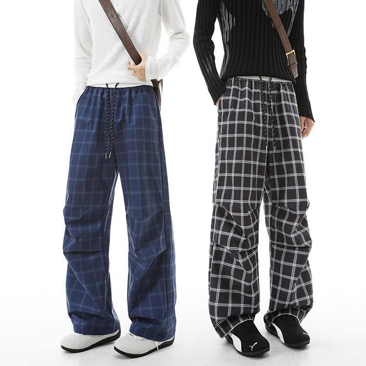 ワイドパンツ メンズ チェック柄 バギーパンツ ルーズパンツ 紐パン ロング丈 ボトムス カジュアル 秋冬シーズンムードを高めてくれるチェック柄と相まって、この秋冬毎日着たいと思えるトレンドボトムスです。[素材]100％ポリエステル[原産国...
