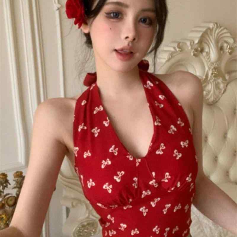 ・カテゴリ: キャミソール・スタイル: スウィート、フェミニン・デザイン: ホルターネック・シルエット: スリムフィット・着丈: ショート丈（約40cm〜50cm）・主な素材: ポリエステル・素材割合: ポリエステル90%以上95%未満・カ...