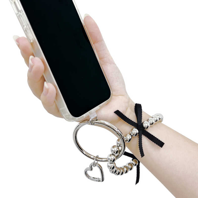 【商品解説】スマホケースにはさむだけ！カンタンかわいい落下防止ハンドストラップ ●スマホケースに挟むだけで使用可能 ●メタルビーズのハンドストラップに腕を通して落下防止に ●着脱が簡単な大きめカラビナ付き ●小さめカラビナはチャームやキーホ...