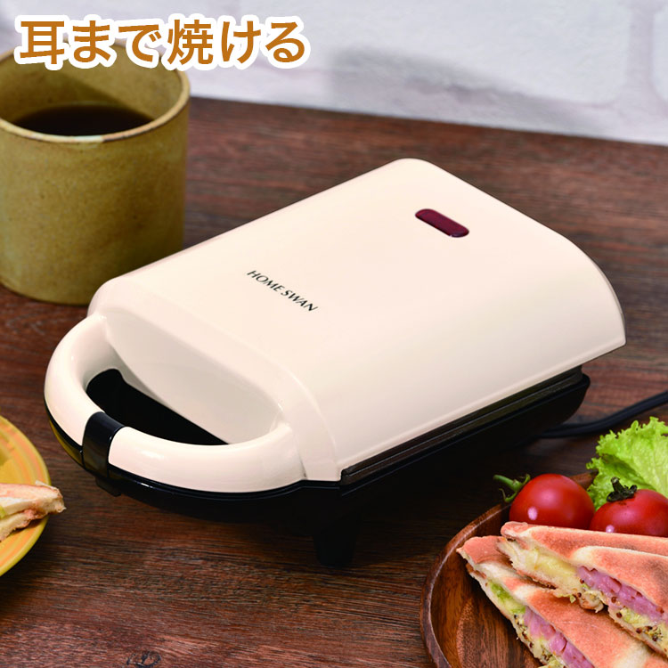 ■商品サイズ:幅15.5×奥行22×高さ9.5cm 860g■完成品■材質本体:フェノール樹脂プレート:アルミダイキャスト(フッ素樹脂塗装)AC100V-600Wコード長さ:1.0m8枚切り専用耳まで焼けるホットサンドメーカー。1個焼きのシ...