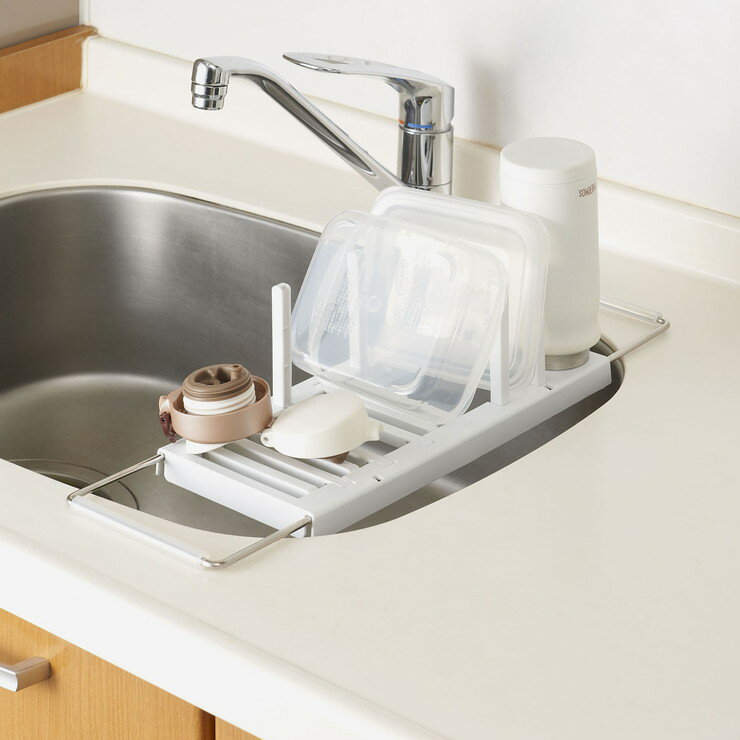 【サイズ】幅14×奥34~50×高さ2・10.7cm【重量（kg）】0.34【素材・材質】材質:本体・スタンド/PP、アーム/ステンレス、すべり止め/シリコーンゴム【生産国】中国【特徴】コップなどの水切り！ペットボトルや食品トレーの乾燥に！...