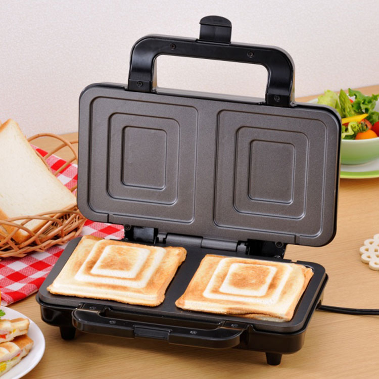 ■商品サイズ:幅29×奥行24.5×高さ10cm 1630g■完成品■材質本体:フェノール樹脂プレート:アルミダイキャスト(フッ素樹脂塗装)AC100V・900Wコード長さ:1.4mプレート固定式食パンの耳を切らずにそのまま使えるホットサン...
