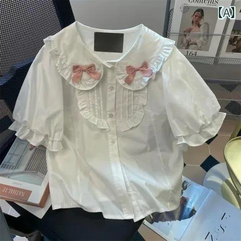 ・柄: 蝶結び・スタイル: 開衫・袖丈: 短袖・素材加工: ピース/スプライス・版型: 標準・衣丈: 普通款(50cm<衣長≤65cm)・ネックライン: ラウンドネック・袖型: 標準袖・流行要素: ボタン・カラー展開: ホワイト・サイ...