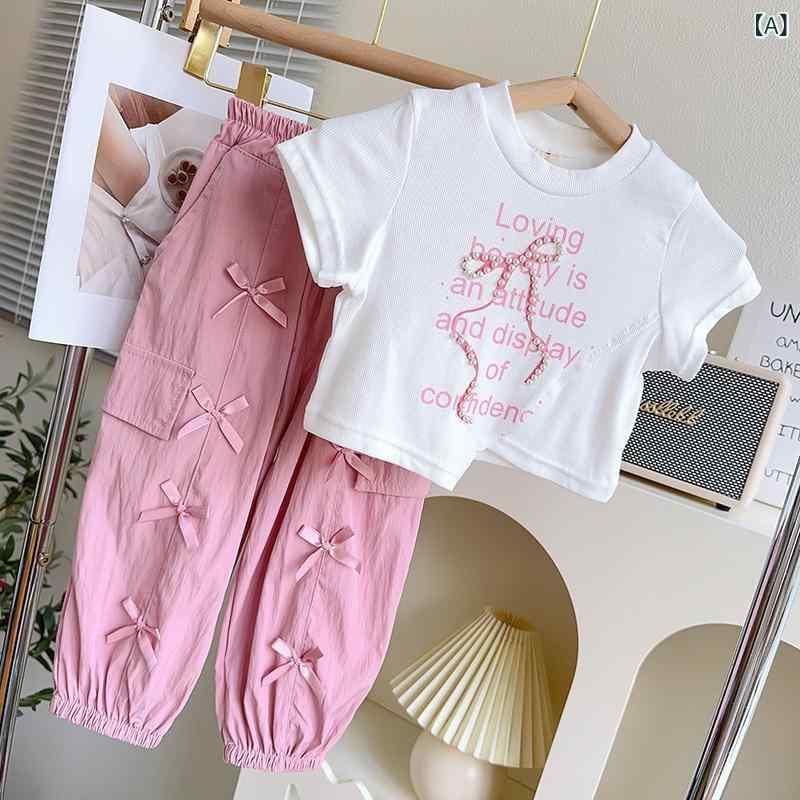 ・カテゴリ: 童セット・スタイル: 甘め・セット内容: トップス+パンツ・袖丈: 短袖・パンツ丈: ロング・主な素材: 綿100%・加工: 柔軟・厚み: 薄手・柄: 無地・要素: セットアップ、蝶結び・トップスタイプ: プルオーバー・カラー...