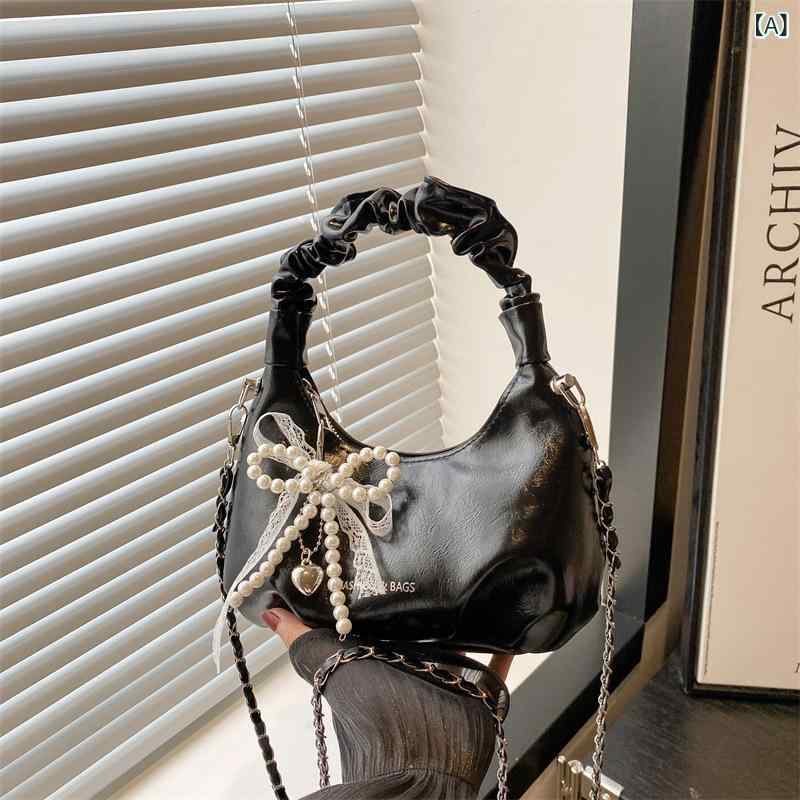 ・カテゴリ: バッグ・スタイル: 都会的シンプル・主な素材: PU・デザイン: クラウドバッグ・サイズ: 中・トレンド要素: ステッチ・形状: 横型スクエア・開閉: ジッパー・内部構造: カードポケット・硬さ: 中程度の柔らかさ・外ポケット...