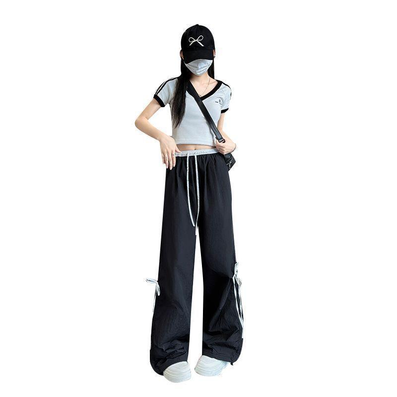 ・カテゴリ: カジュアルパンツ・素材: シェニール、スパンデックス（30%以下）・スタイル: コンパニオン風、お姉さん風・パンツタイプ: ラッパパンツ・パンツ丈: 3分丈・デザイン: ドローストリング・カラー展開: ブラック、レッド、アイス...