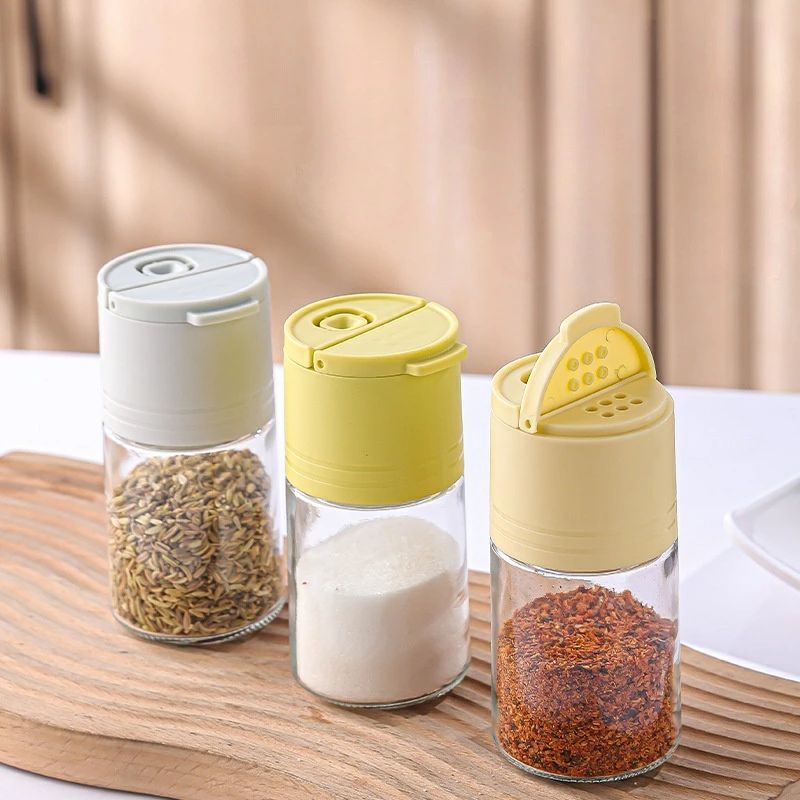 製品説明：この100ml透明ガラス調味料ボトルは、美しさと実用性を兼ね備え、キッチンに最適です。食品グレードのガラス製で、調味料の安全性を確保します。透明なデザインで中身が見やすく、優れた密閉性により、塩、砂糖、各種スパイスの鮮度を完璧に保...
