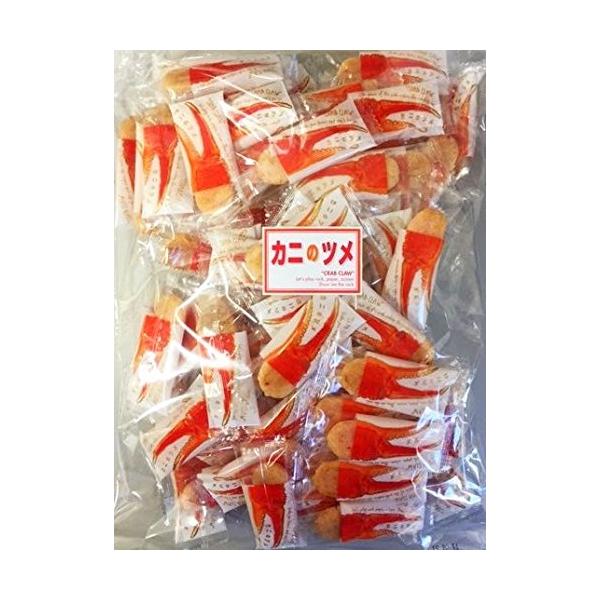 【商品名】 カニのツメあられ 【原材料】 うるち米（国産）、植物油脂、カニ風味パウダー（デキストリン、酵母エキス、魚介エキス、食塩、その他）、えび、調味塩／調味料（アミノ酸等）、着色料（カラメル、赤色102号）、香料、（一部に小麦・えび・か...