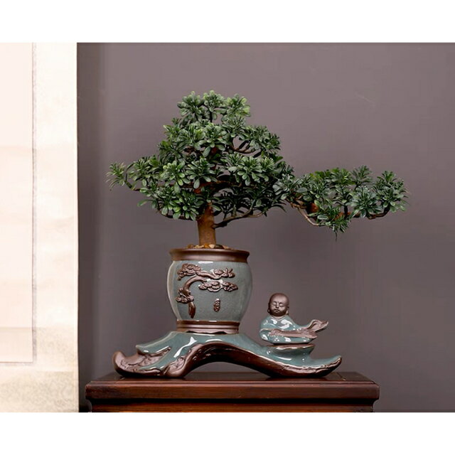 商品説明 葉の材質：エコプラスチック+セラミック幹の材質：自然木（特殊加工）鉢の材質：陶器製外寸サイズ:幅34&nbsp;&nbsp;x&nbsp;奥行き13&nbsp;x&nbsp;高さ30（cm)※天然素材を使用し、ハンドメイドで作成し...